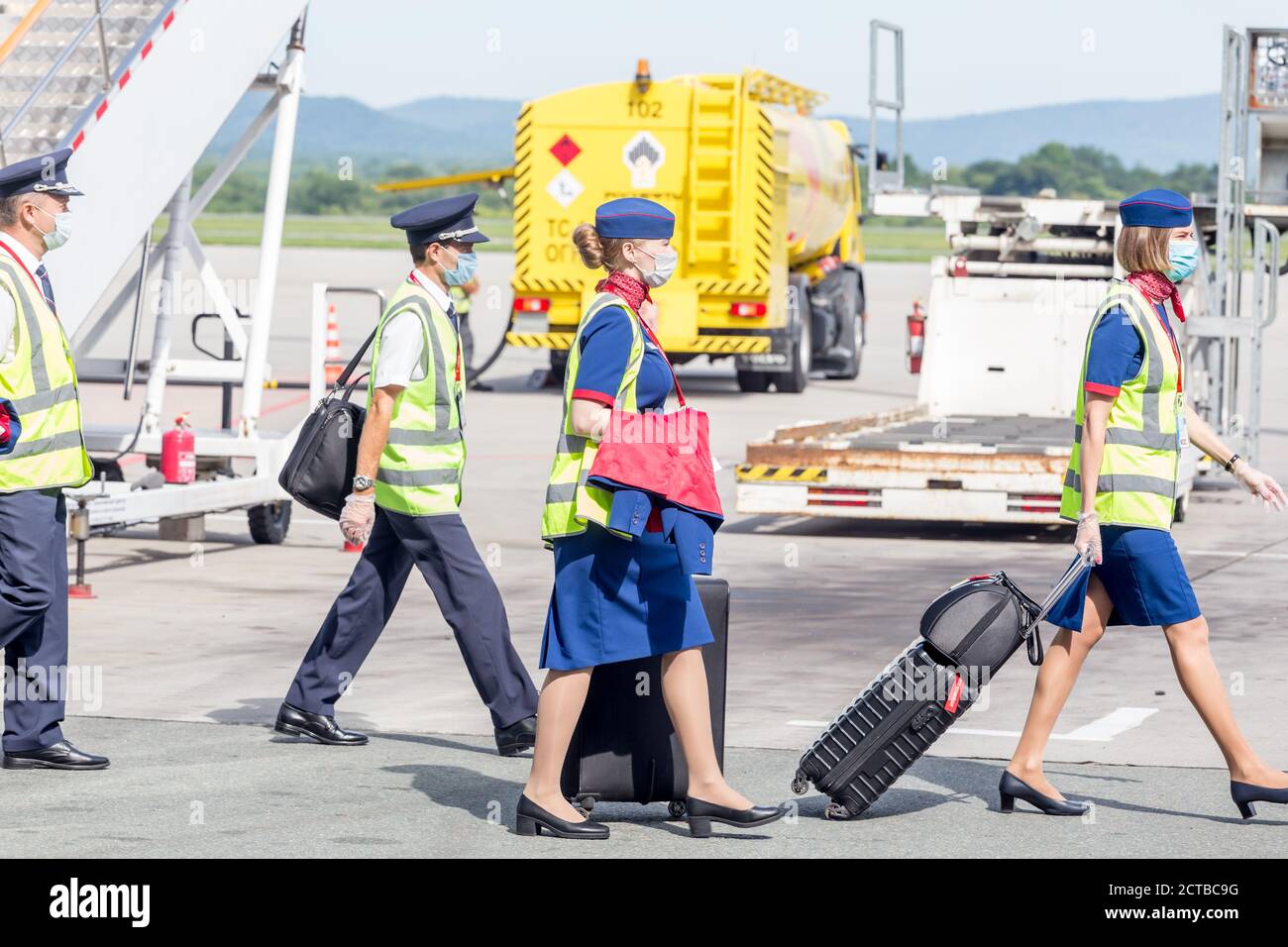 Russia, Vladivostok, 08/17/2020. Crew of airplane in official uniform ...