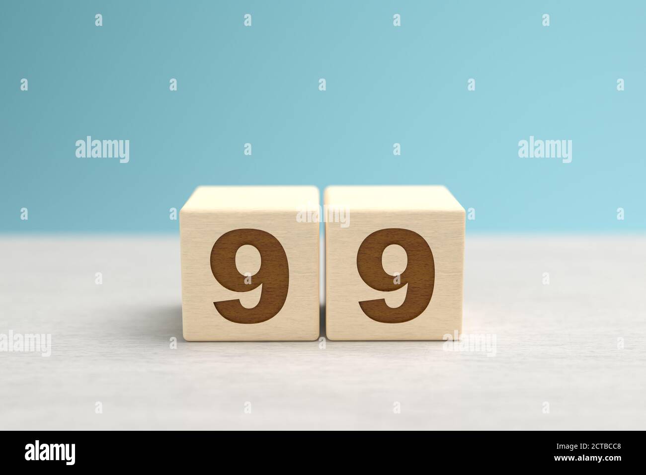 Wooden toy blocks forming the number 99 Stock Photo - Alamy