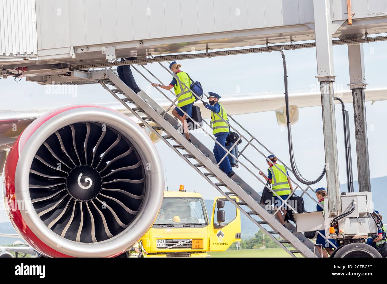 Russia, Vladivostok, 08/17/2020. Crew of airplane in official uniform ...