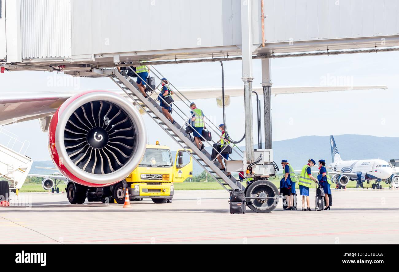 Russia, Vladivostok, 08/17/2020. Crew of airplane in official uniform ...