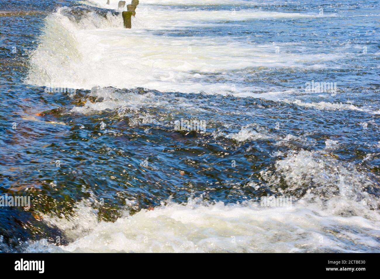 The Usk River in Abergavenny, ancient bridge spanning the river which ...