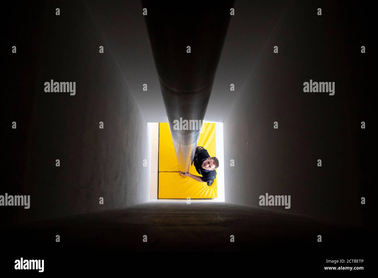 Jaromer, Czech Republic. 22nd Sep, 2020. A firefighter looks up at a ...