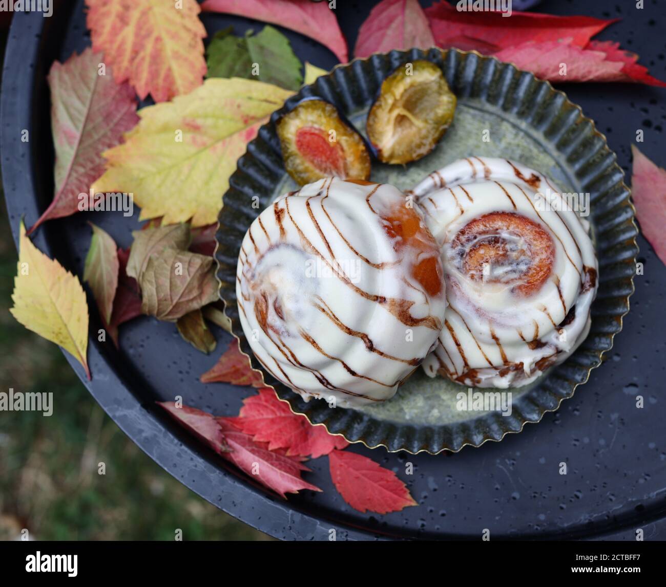 autumn still life with cinnamon rolls Stock Photo - Alamy