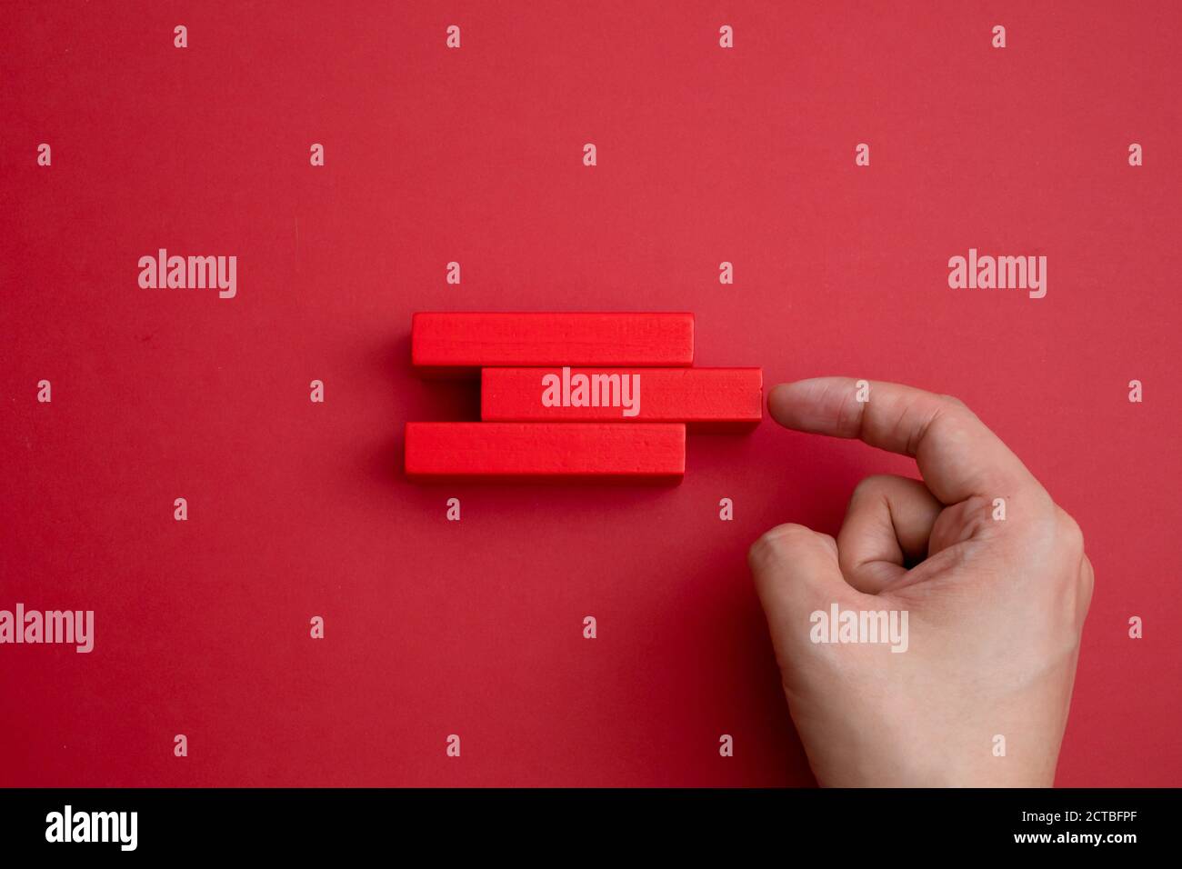 fill a gap in the red block Stock Photo - Alamy