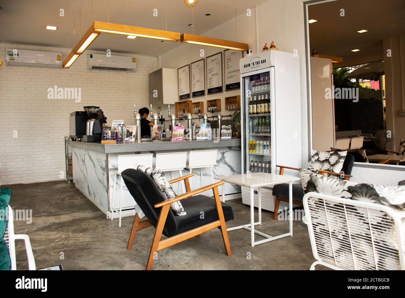 Interior decoration furniture of cafe coffee shop with staff barista ...