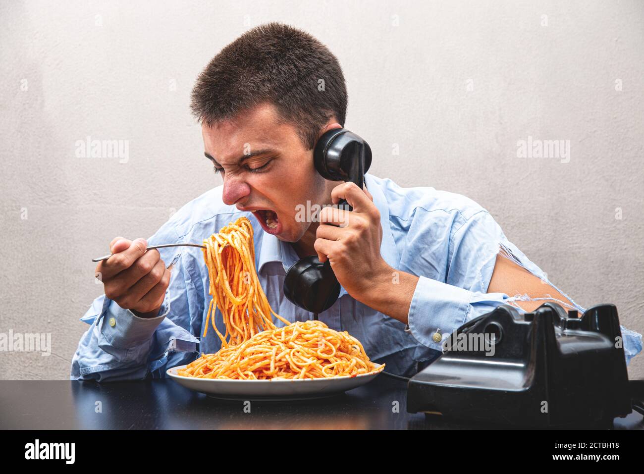 Boy eating spaghetti hi-res stock photography and images - Alamy