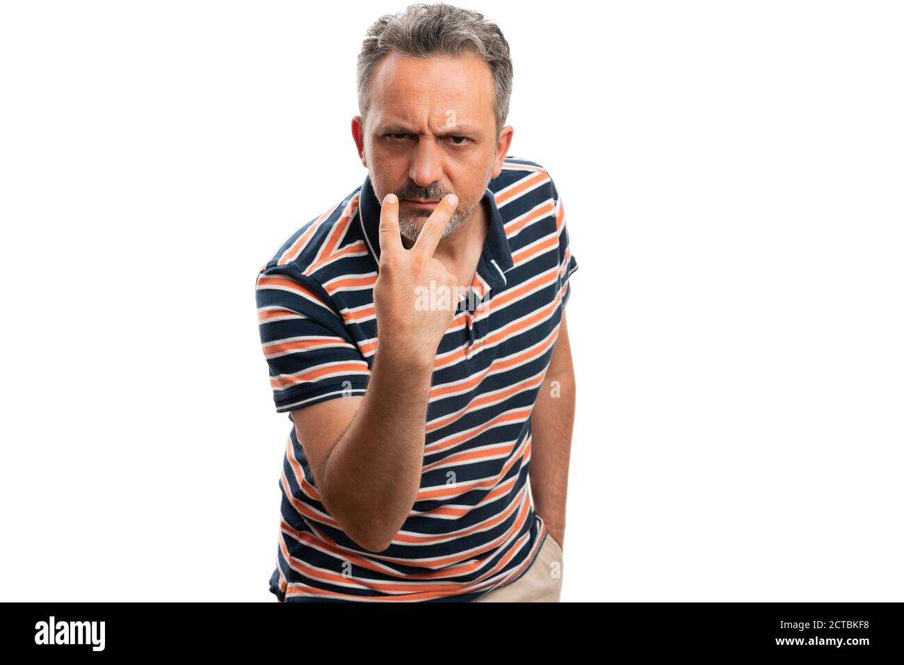 Adult male model making eyes on you gesture with angry mad serious ...