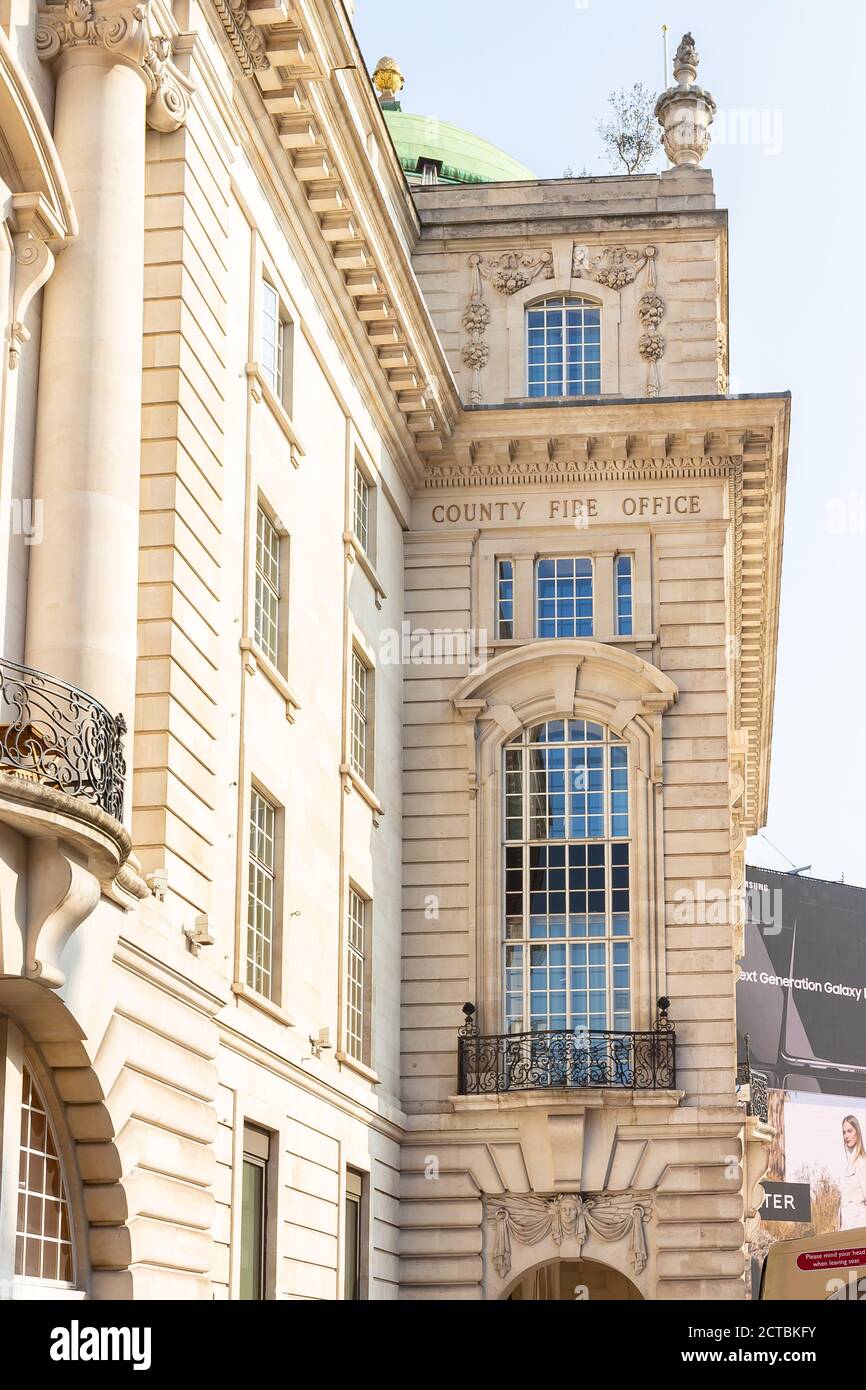 Vertical shot of a multi-floor building with a yellow facade Stock ...