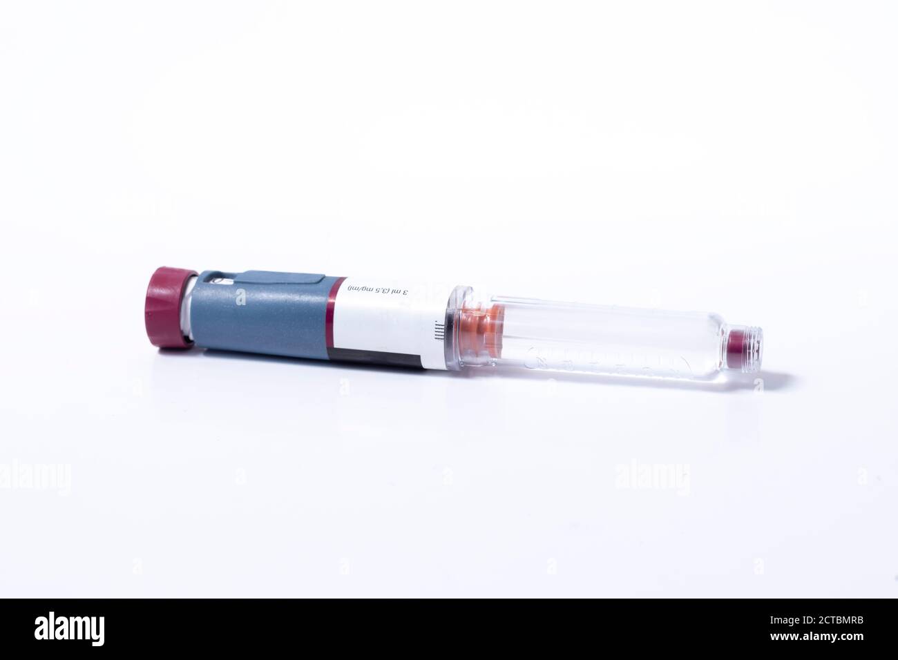 syringe over white background Stock Photo - Alamy