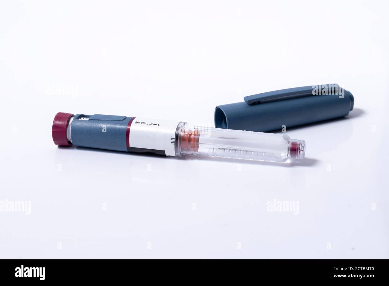 syringe over white background Stock Photo - Alamy