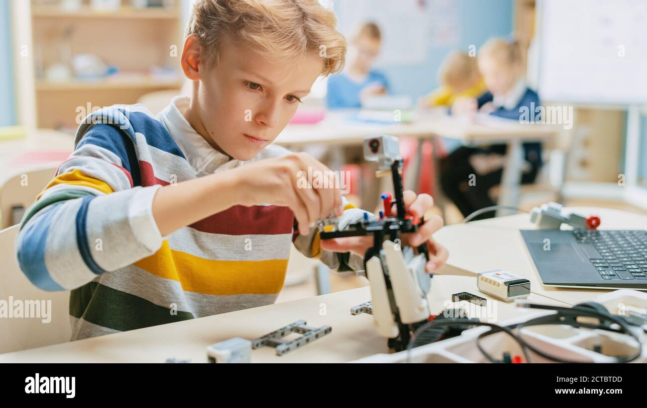 Schoolboy Builds Constructs Small Robot and Uses Laptop to Program ...
