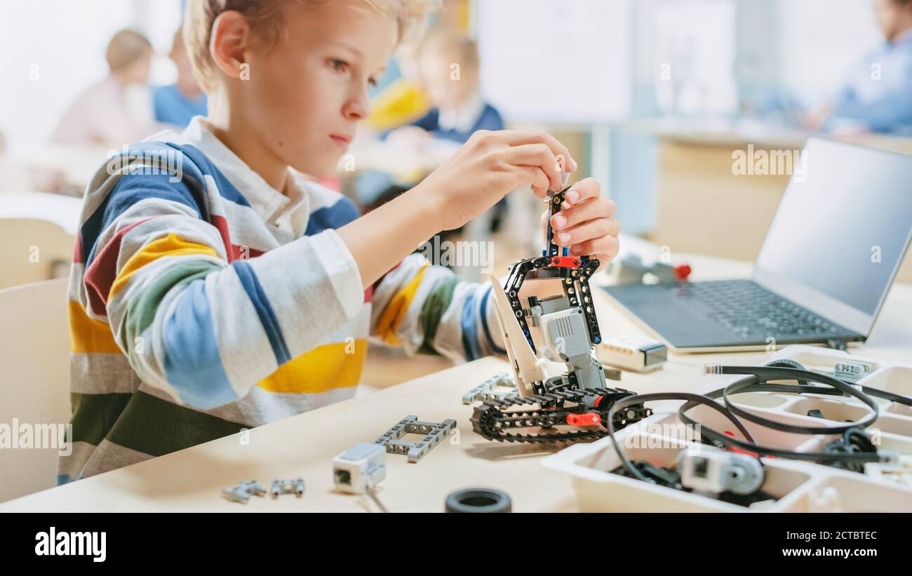 Schoolboy Builds Constructs Small Robot and Uses Laptop to Program ...