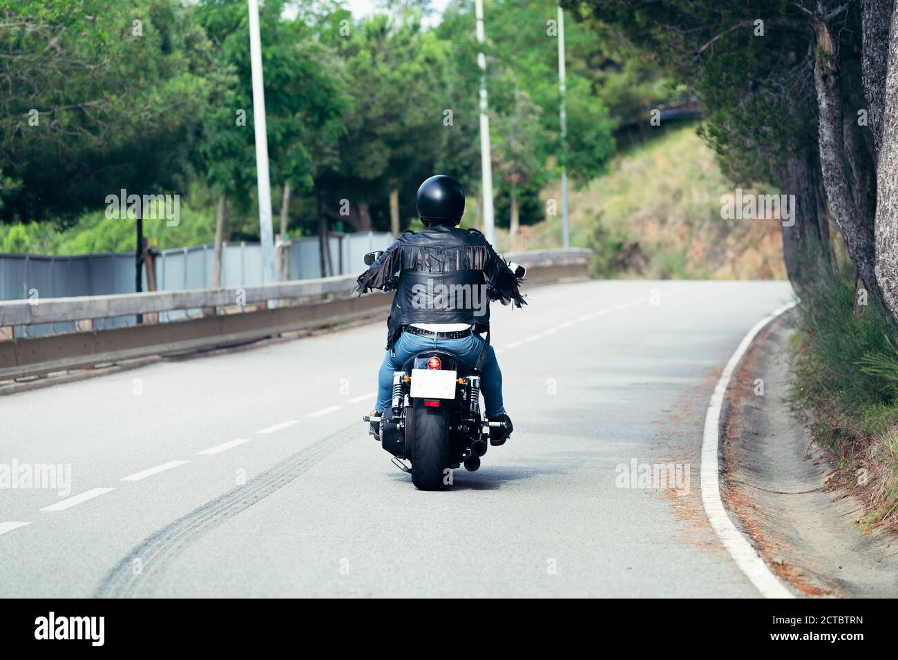 Biker male rear view motorbike hi-res stock photography and images - Alamy