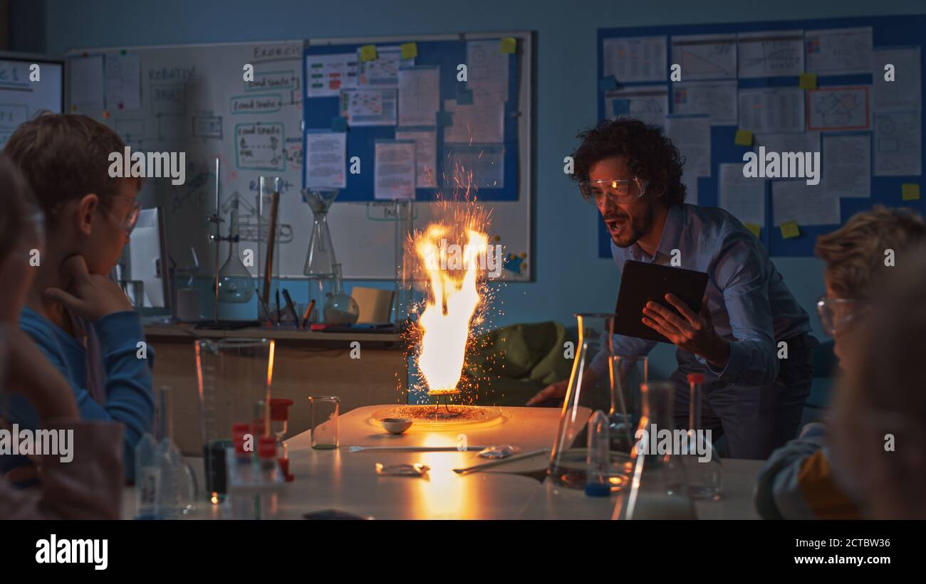 School Chemistry Classroom: Engrossed Children Watch How Enthusiastic ...