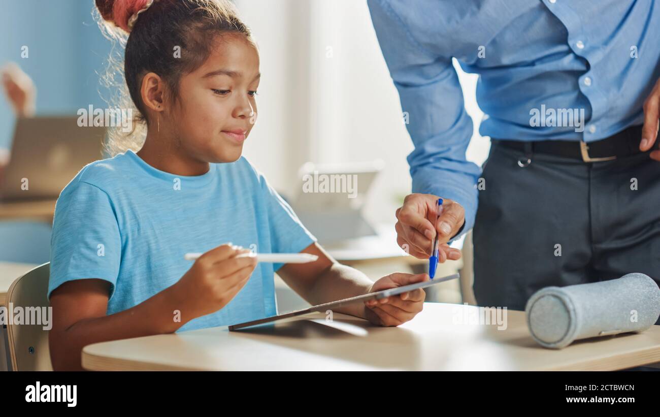 Elementary School Computer Science Class: Smart Girl Uses Digital ... Elementary School Computer Science Class: Smart Girl Uses Digital ...
