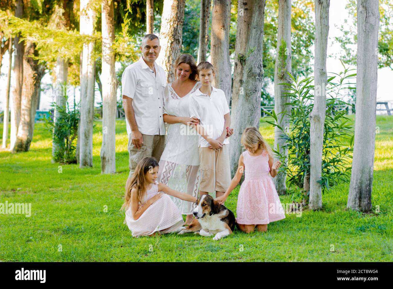 Beautiful family in the summer on a picnic in a green park Stock Photo ...