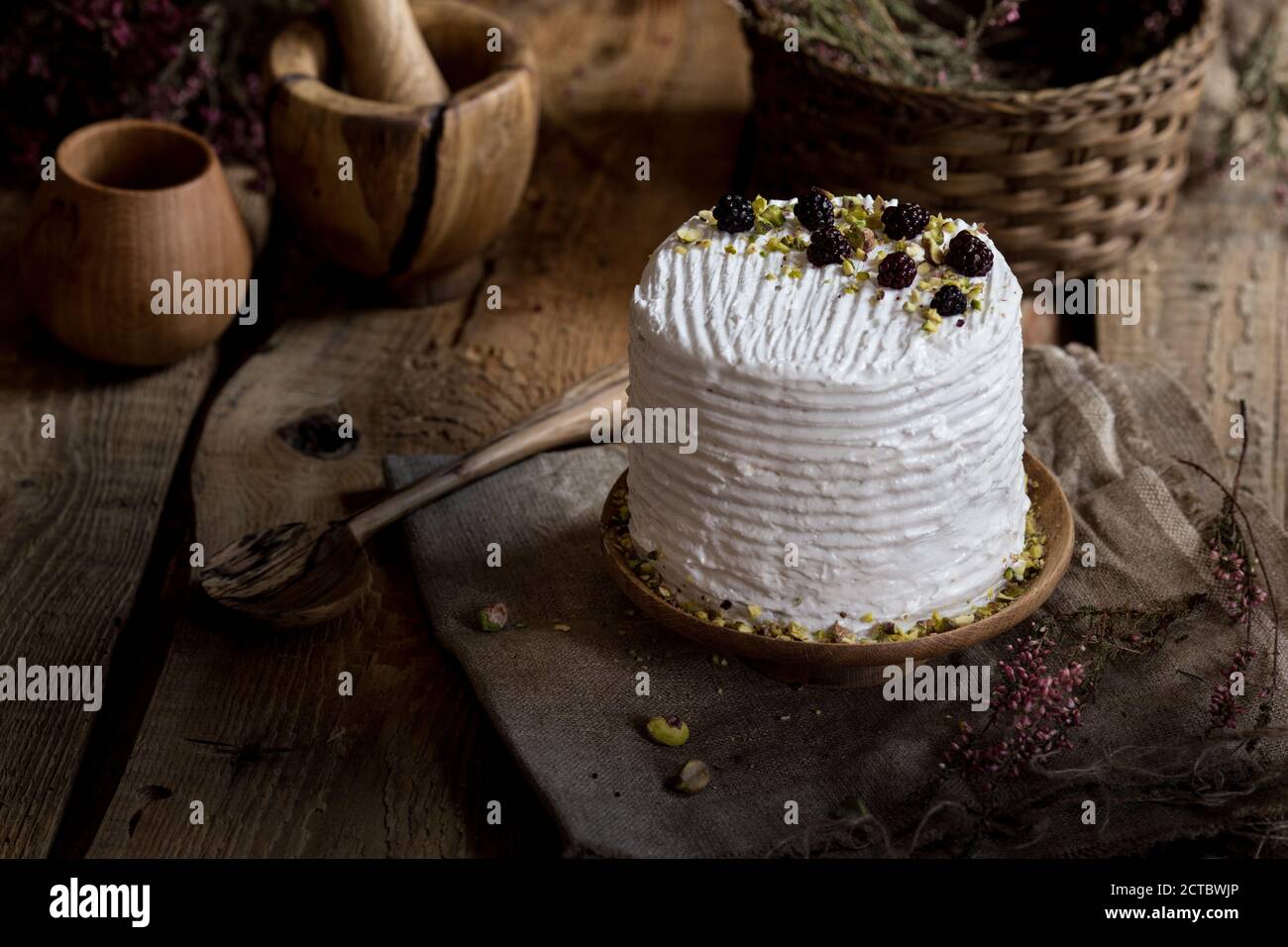 Rustic cake with frosting and blackberries Stock Photo - Alamy