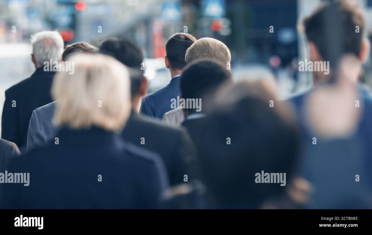 Crowd of people from behind business hi-res stock photography and ...