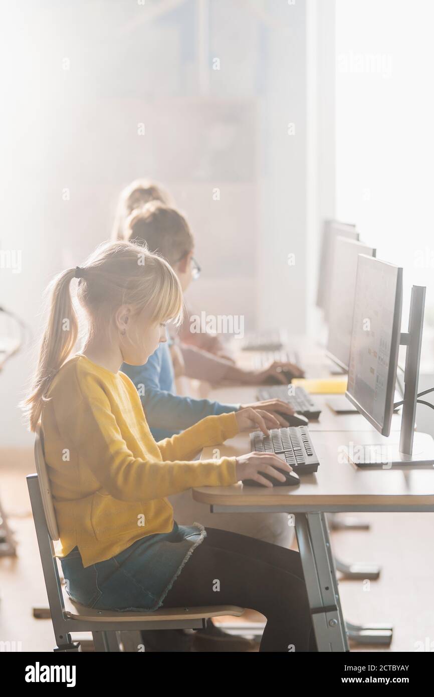 Vertical Shot in Elementary School Computer Science Classroom: Rows of ...