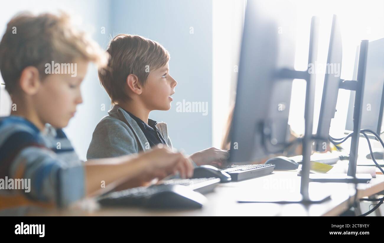 Elementary School Computer Science Classroom: Smart Little Schoolboy ...