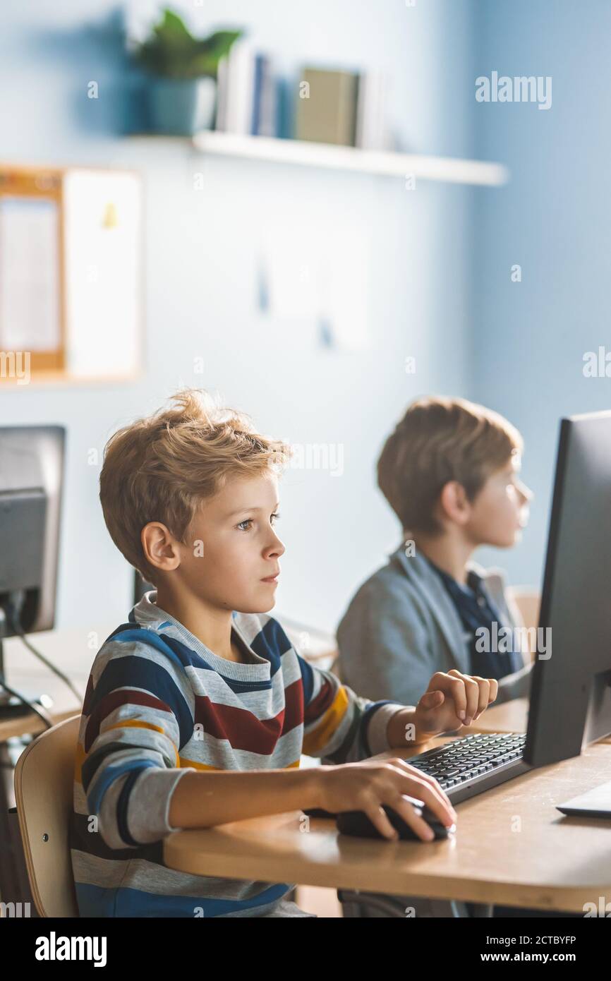 Elementary School Computer Science Classroom: Smart Little Schoolboy ...