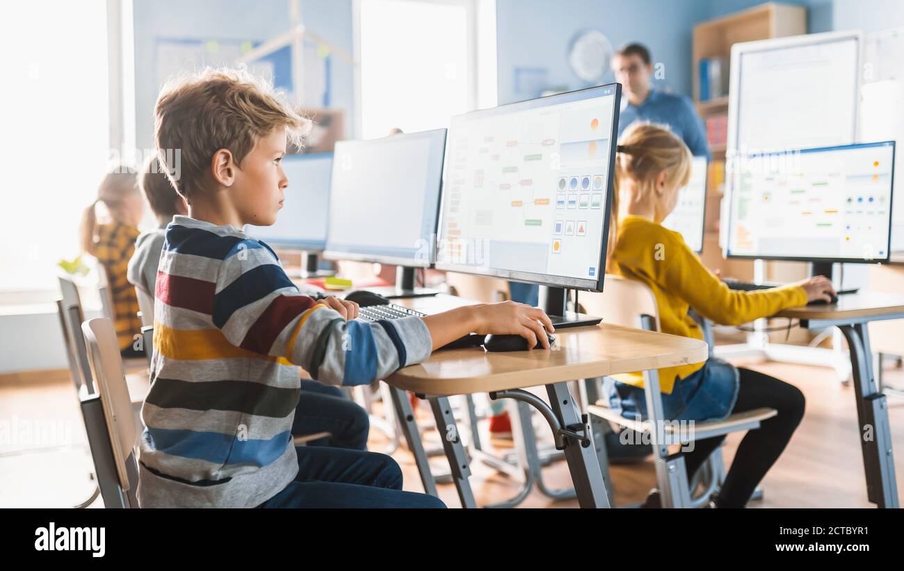 Elementary School Computer Science Classroom: Smart Little Schoolboy ...