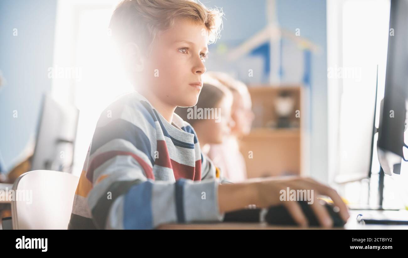 Elementary School Computer Science Classroom: Portrait of a Smart Boy ...