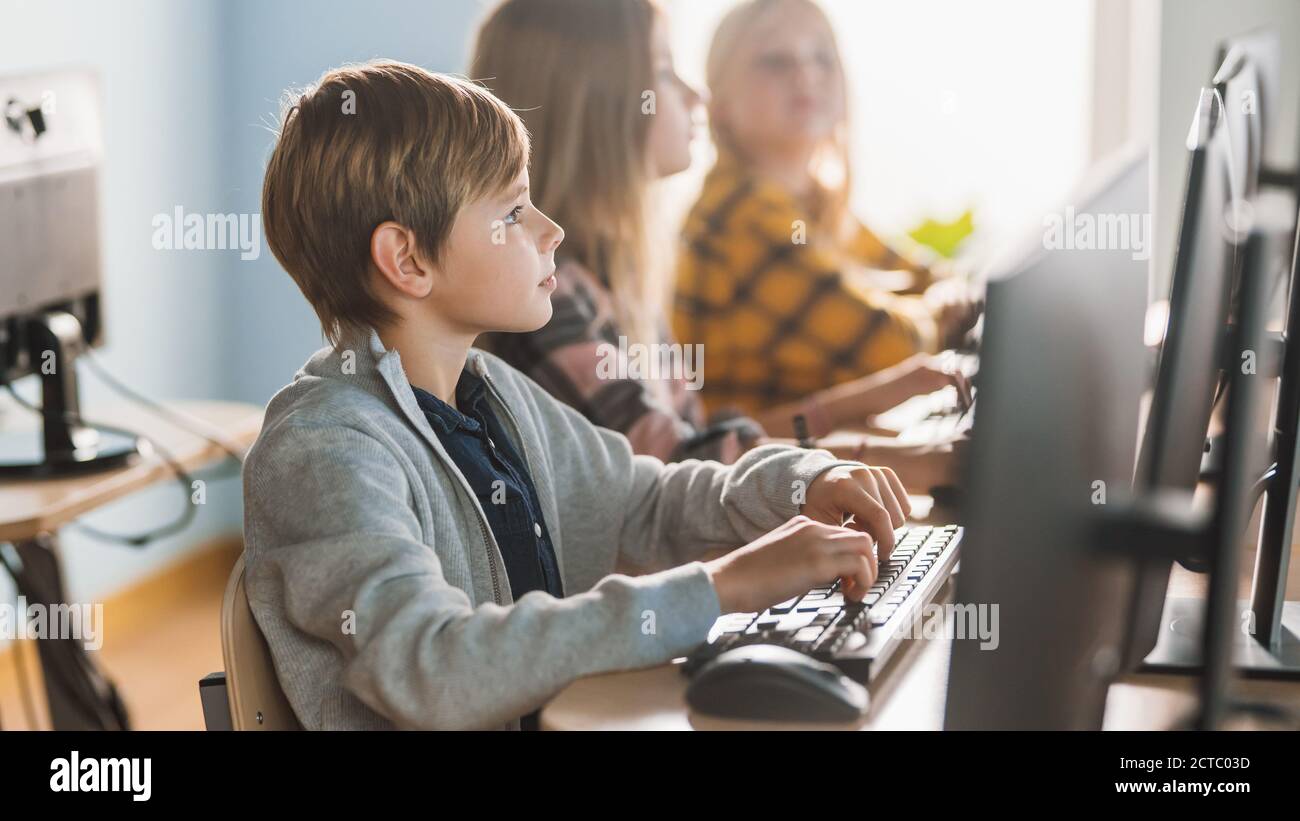 Elementary School Computer Science Classroom: Smart Little Schoolboy ...