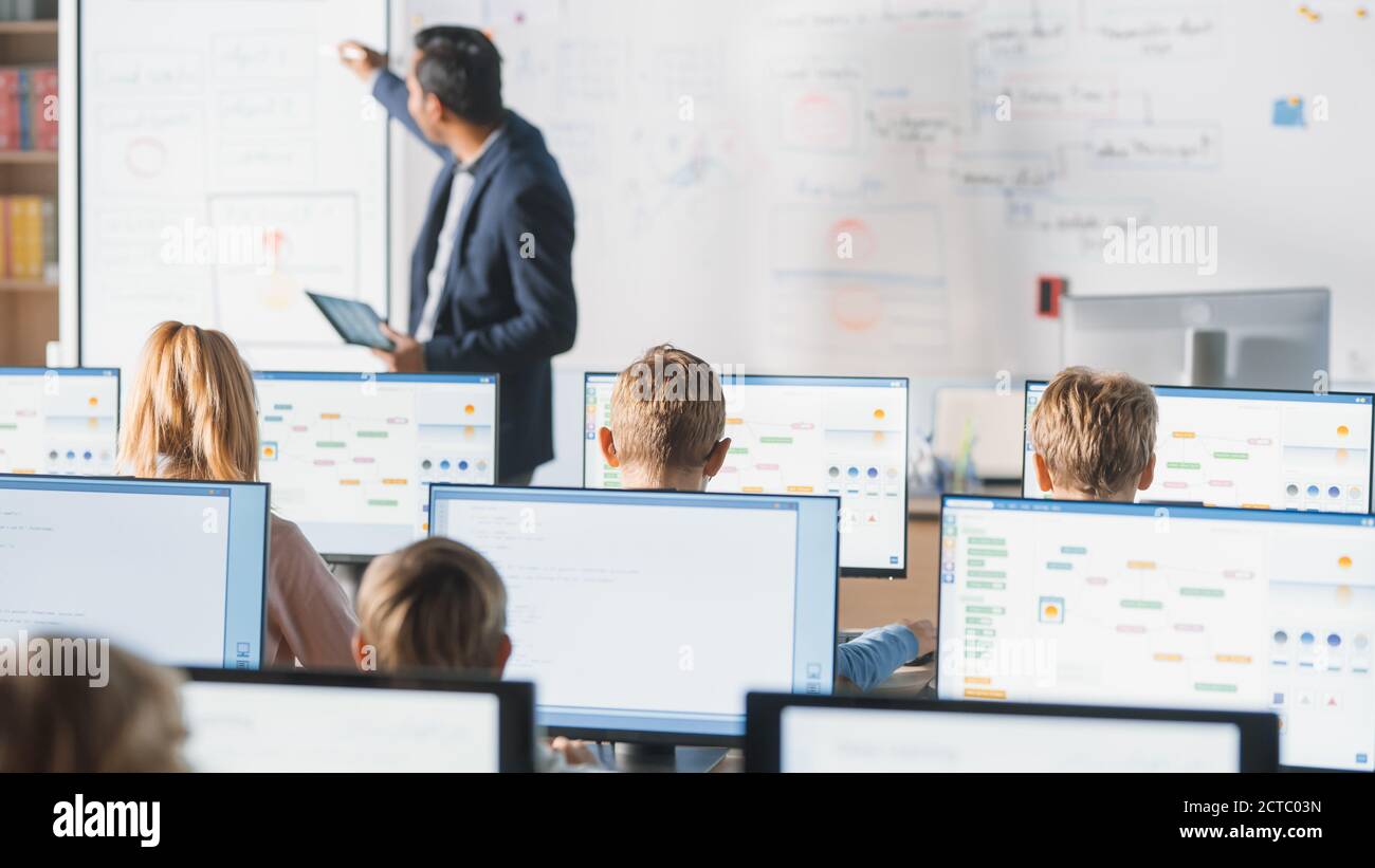 Elementary School Class: Teacher Uses Interactive Digital Whiteboard ...