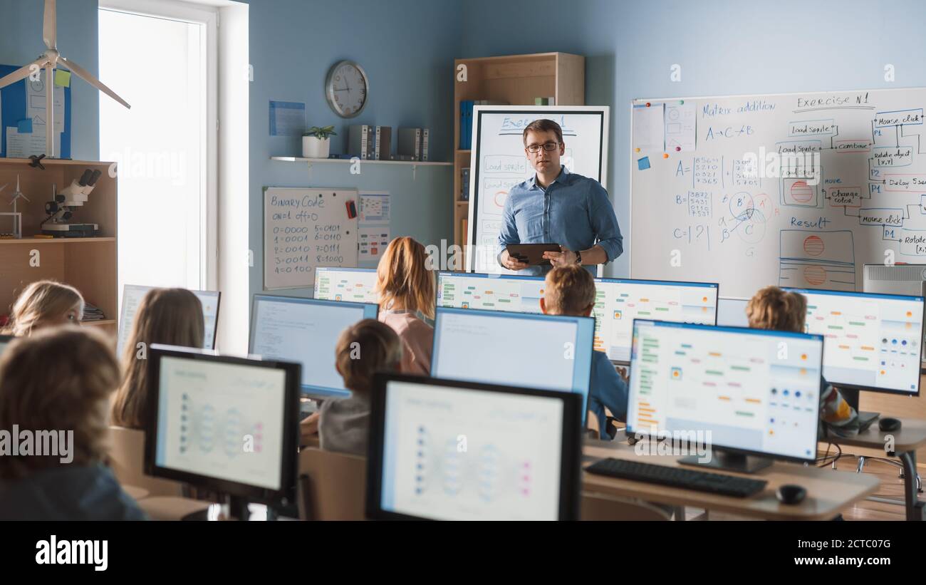 School Class: Portrait of the Enthusiastic and Motivated Teacher Using ...