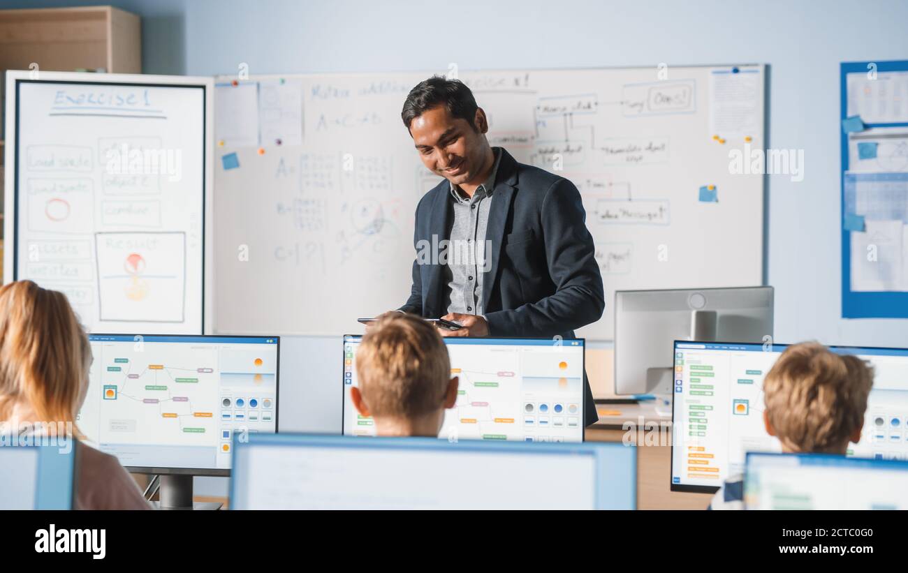 School Class: Portrait of the Enthusiastic and Motivated Teacher Using ...