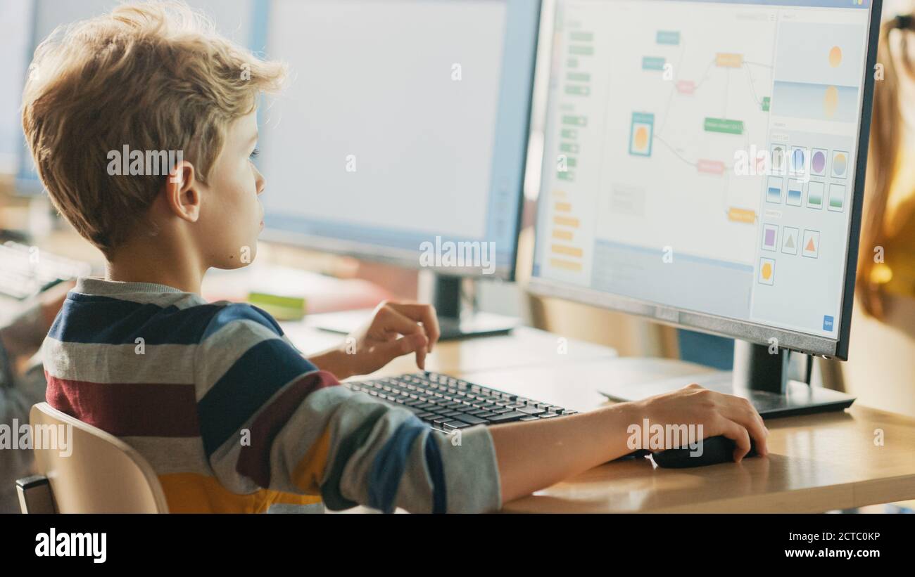 Elementary School Computer Science Classroom: Smart Little Schoolboy ...