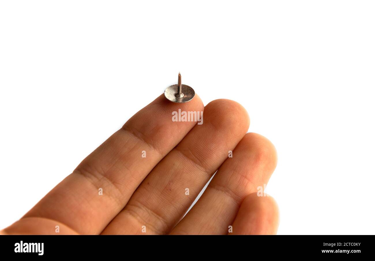 hand's attaching a green thumb stack Stock Photo - Alamy