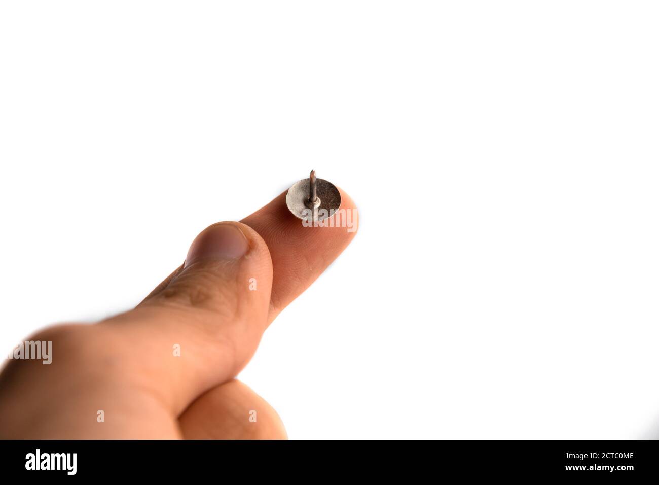 hand's attaching a green thumb stack Stock Photo - Alamy