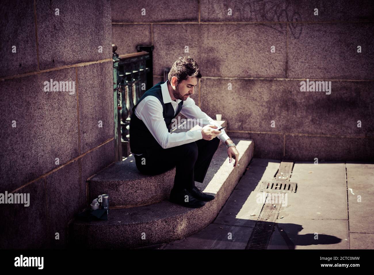 Man taking a smoke break on the streets of London, United Kingdom Stock ...