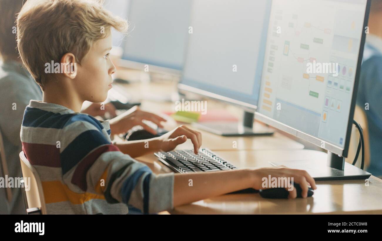 Elementary School Computer Science Classroom: Smart Little Schoolboy ...