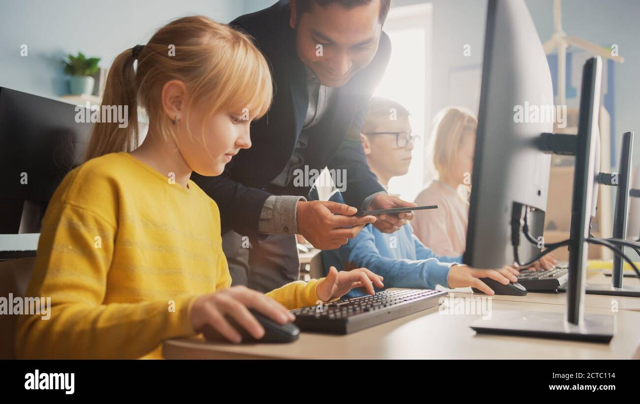 Elementary School Science Classroom: Teacher Explains to a Smart Little ...