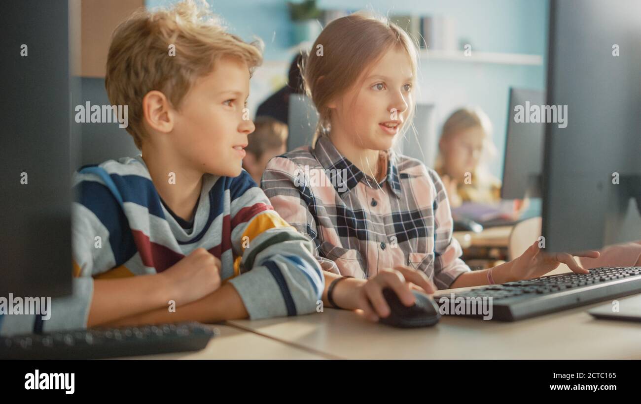 Elementary School Computer Science Classroom: Portrait of Smart Girl ...