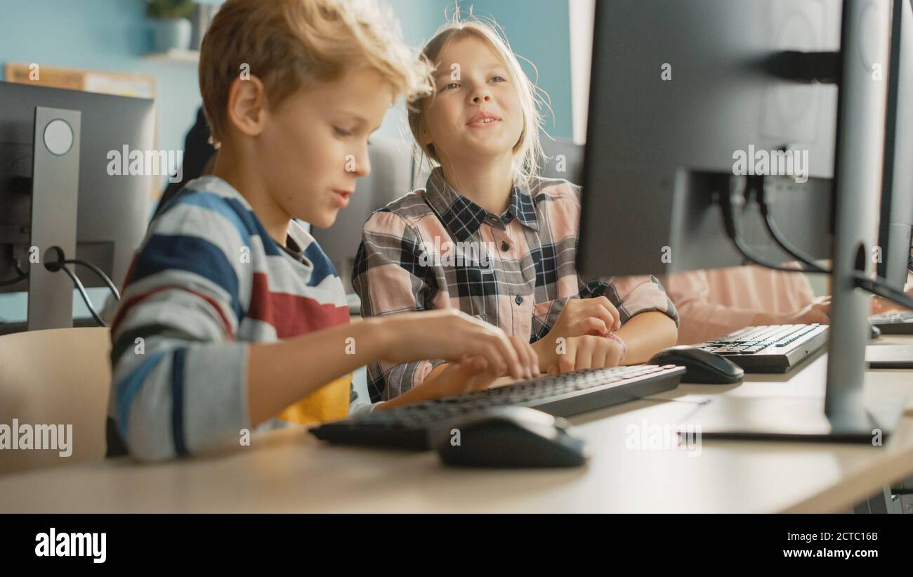 Elementary School Computer Science Classroom: Portrait of Smart Girl ...