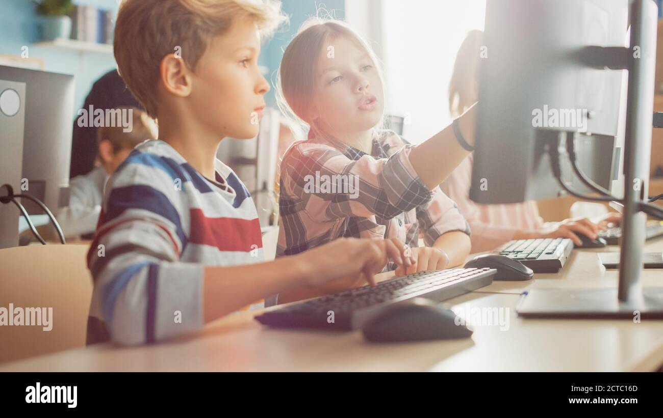 Elementary School Computer Science Classroom: Portrait of Smart Girl ...