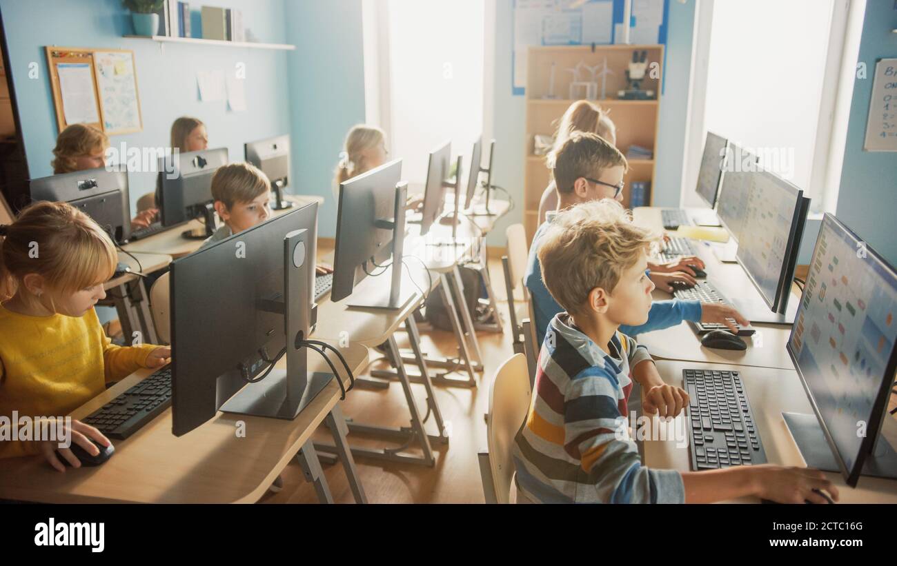 Elementary School Computer Science Classroom: Diverse Group of Little ...