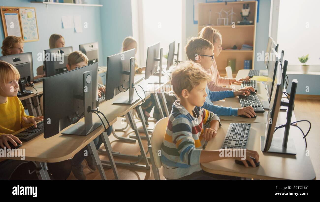 Elementary School Computer Science Classroom: Diverse Group of Little ...