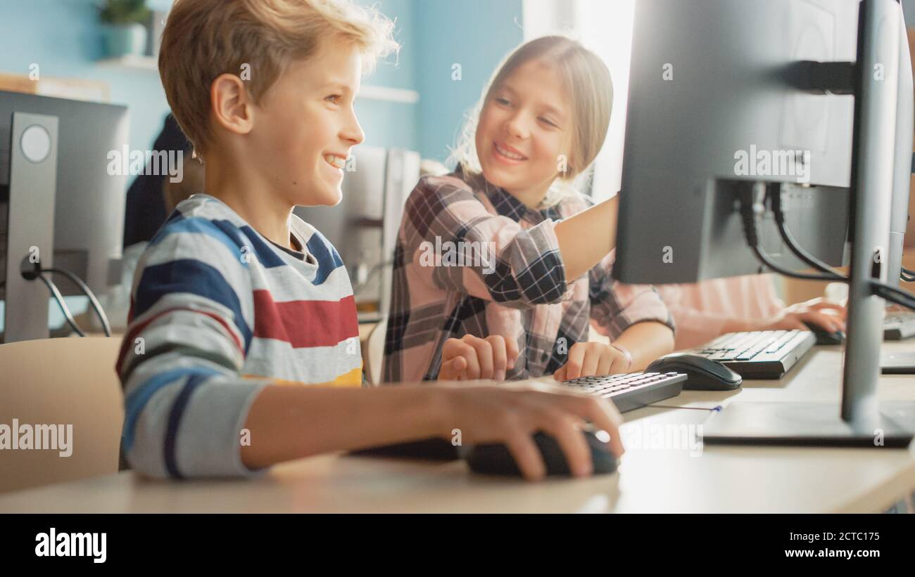 Elementary School Computer Science Classroom: Portrait of Smart Girl ...