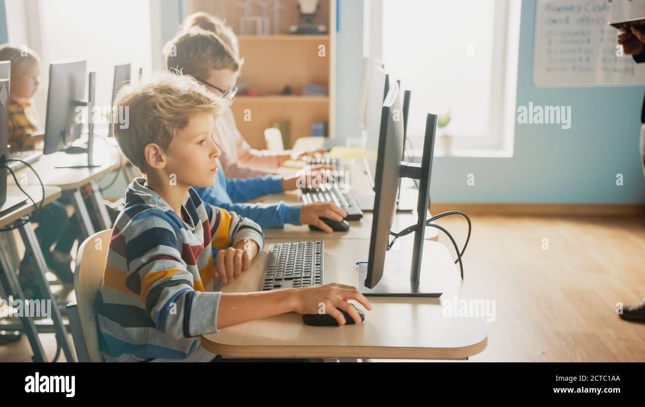 Elementary School Computer Science Classroom: Diverse Group of Little ...