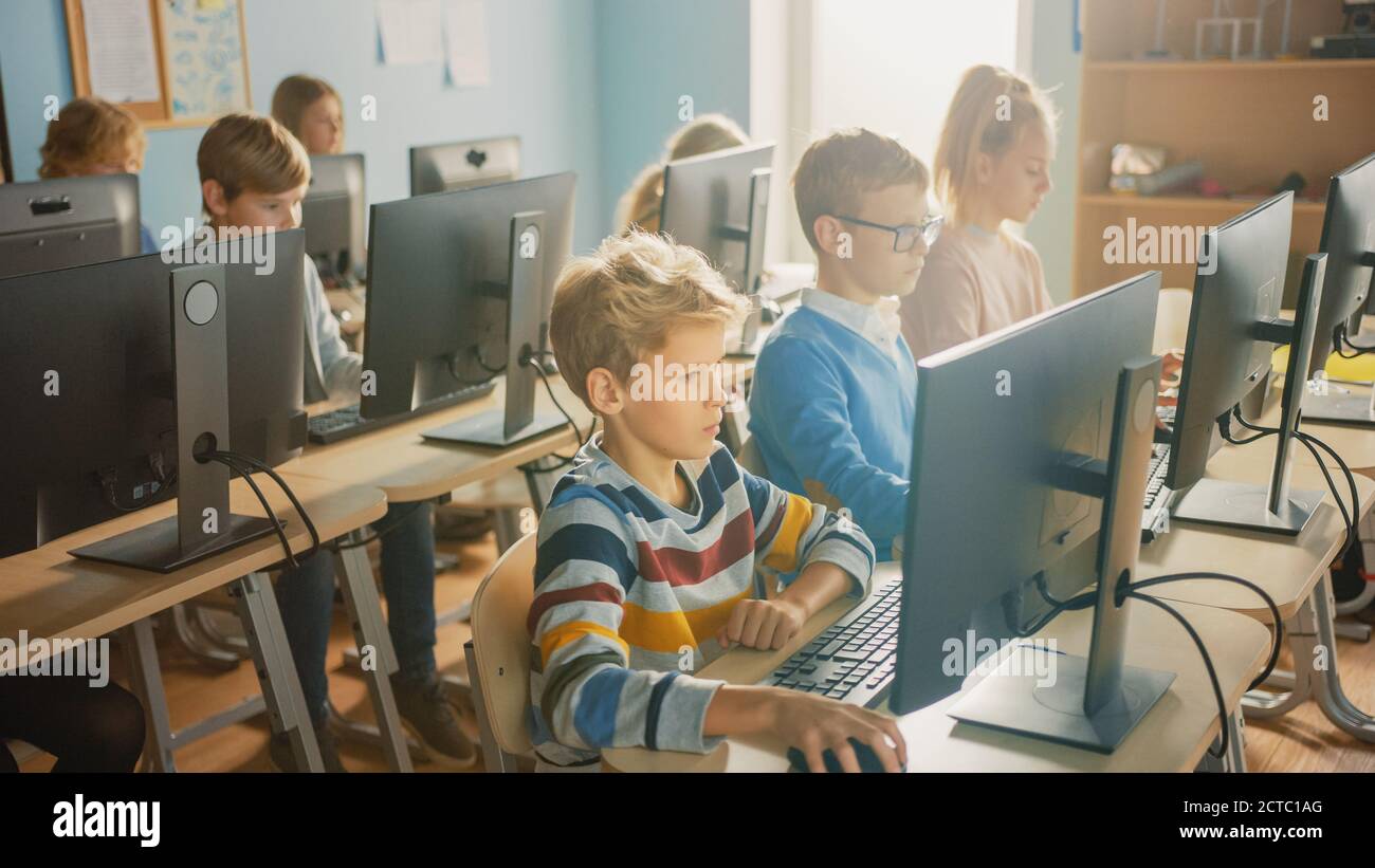 Elementary School Computer Science Classroom: Diverse Group of Little ...