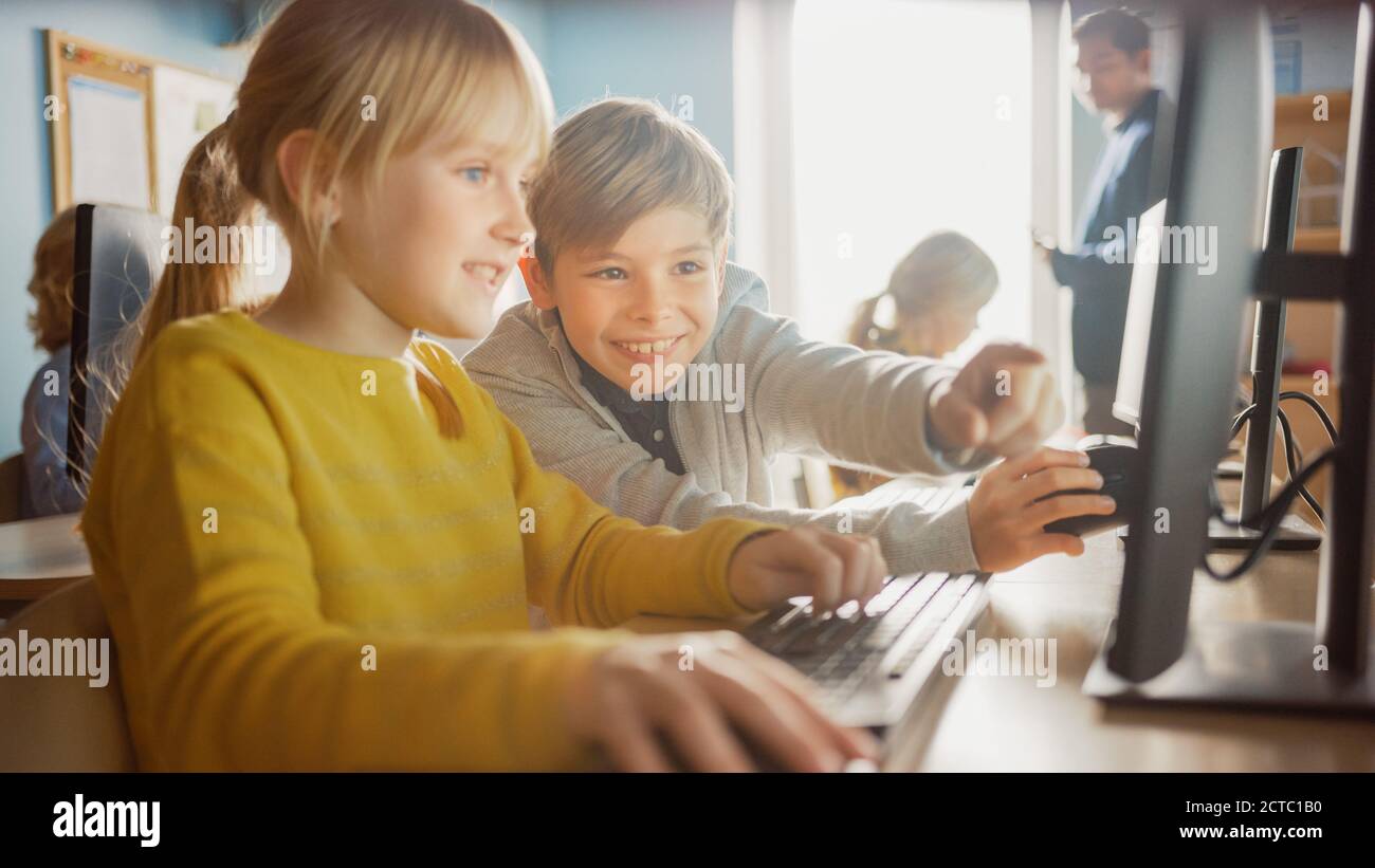 Elementary School Computer Science Classroom: Portrait of Smart Girl ...