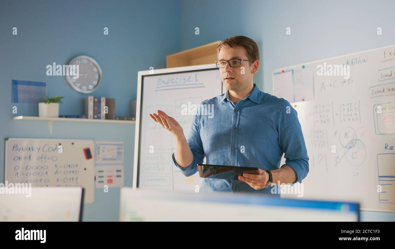 School Class: Portrait of the Enthusiastic and Motivated Teacher Using ...