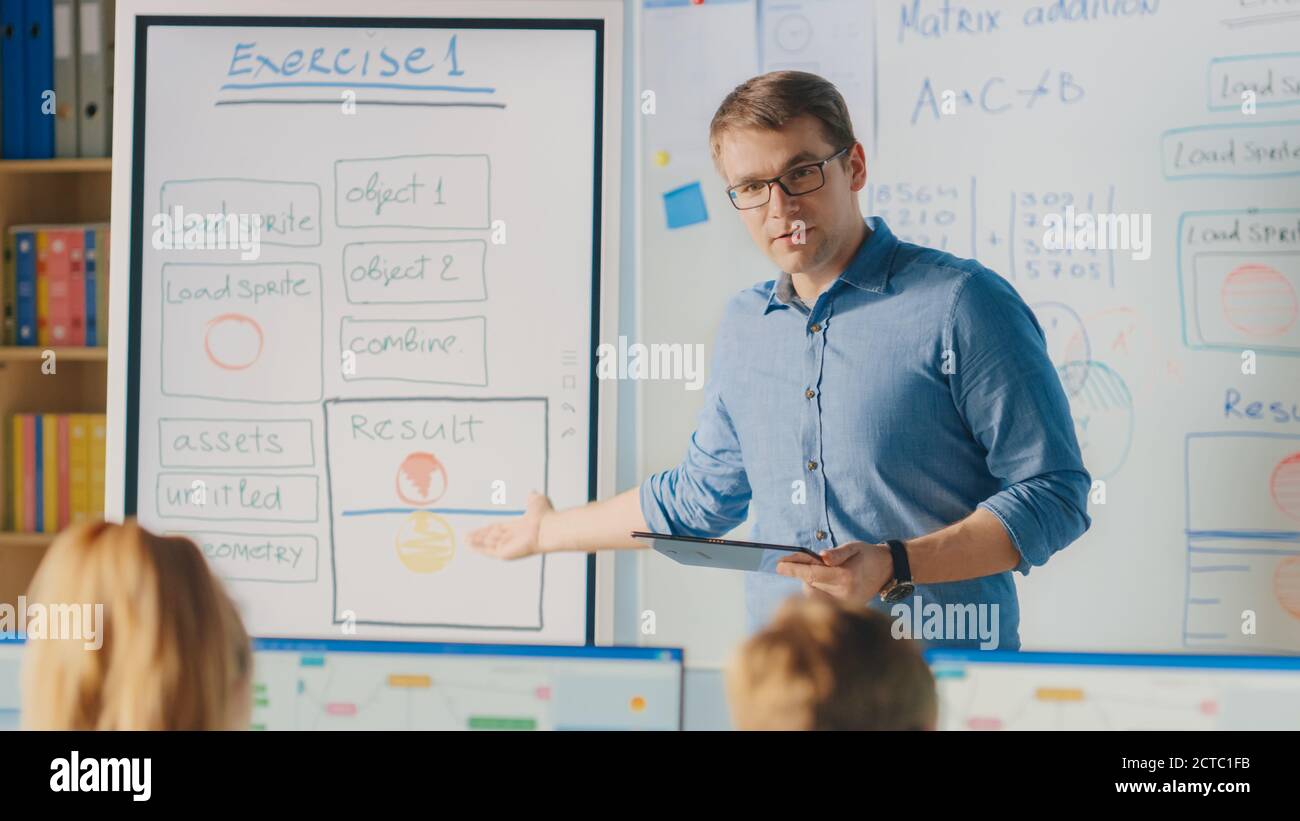 Elementary School Class: Teacher Uses Interactive Digital Whiteboard ...