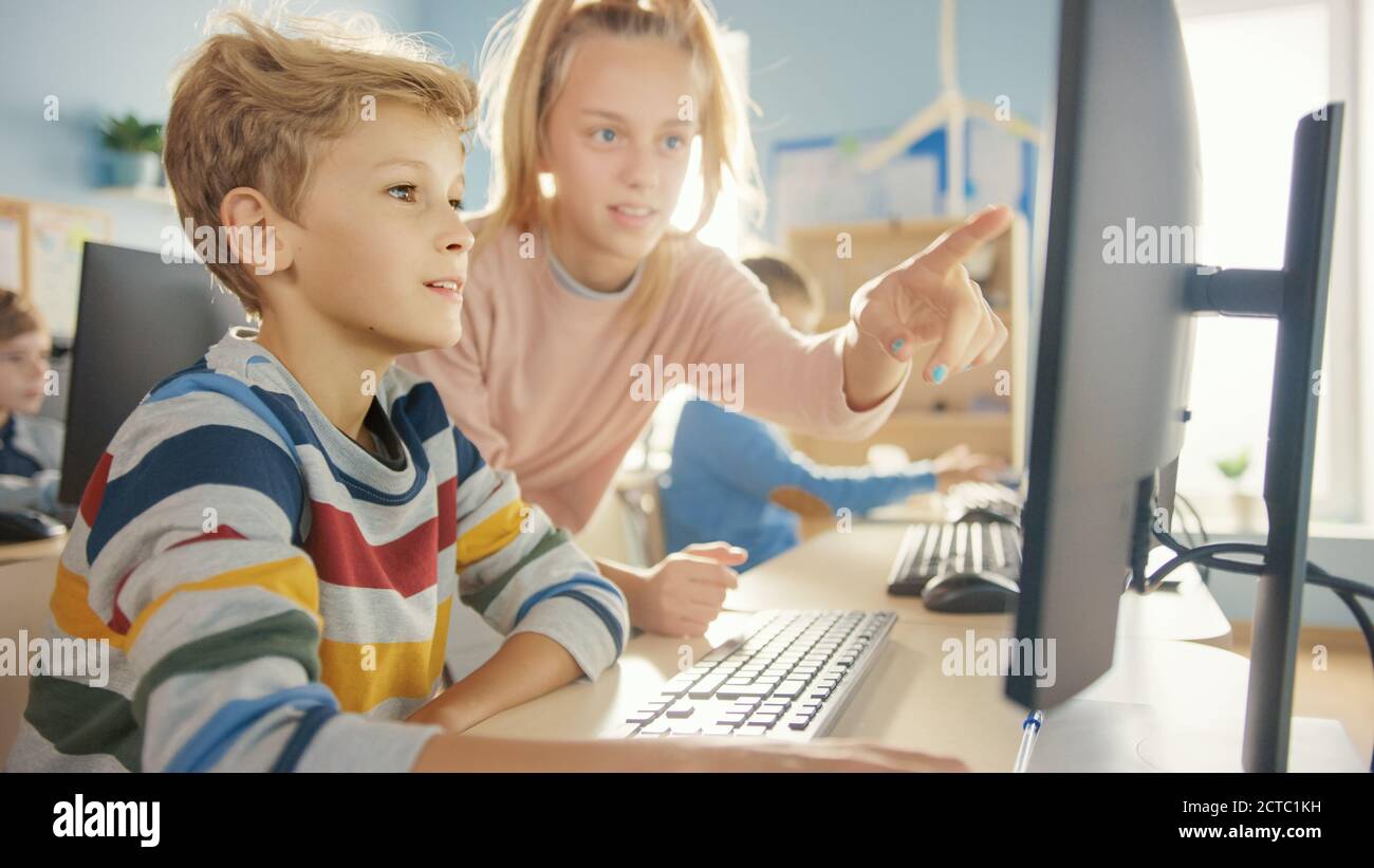Elementary School Computer Science Classroom: Portrait of Smart Girl ...