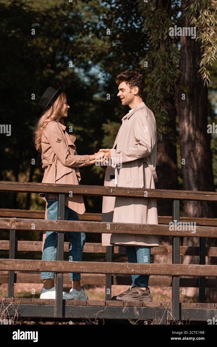 Couple in trench coats hi-res stock photography and images - Alamy